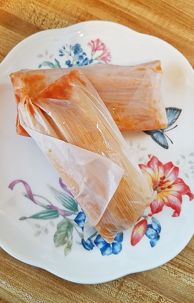 These tamales aren't just wrapped in corn husks—they're wrapped in tradition. Unwrap one and release a cloud of aromatic steam that whispers "homemade."