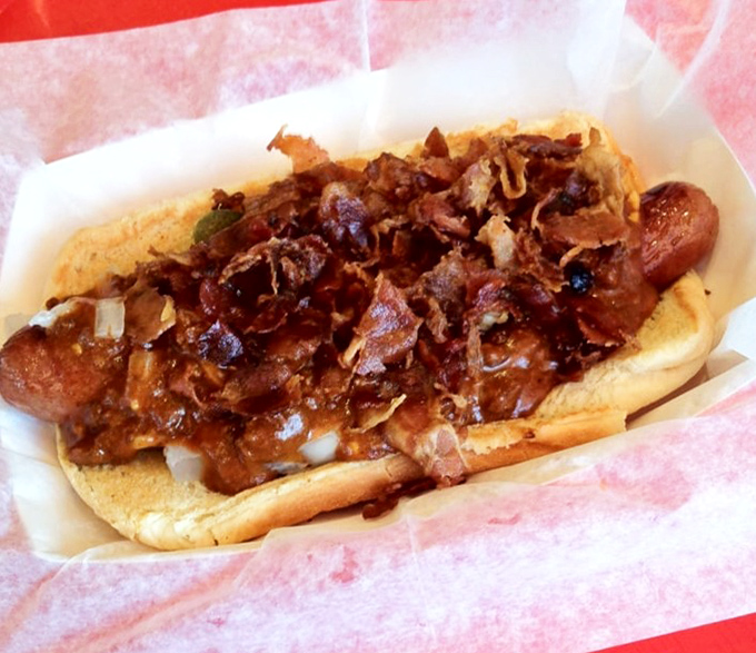This isn't just a chili dog—it's a masterpiece of meat-on-meat architecture that demands both napkins and respect.