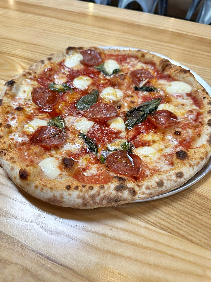 The Angry Beekeeper pizza showcases the beautiful marriage of spicy salami and sweet honey. Like finding out your high school nemesis and best friend eloped—surprisingly perfect together.