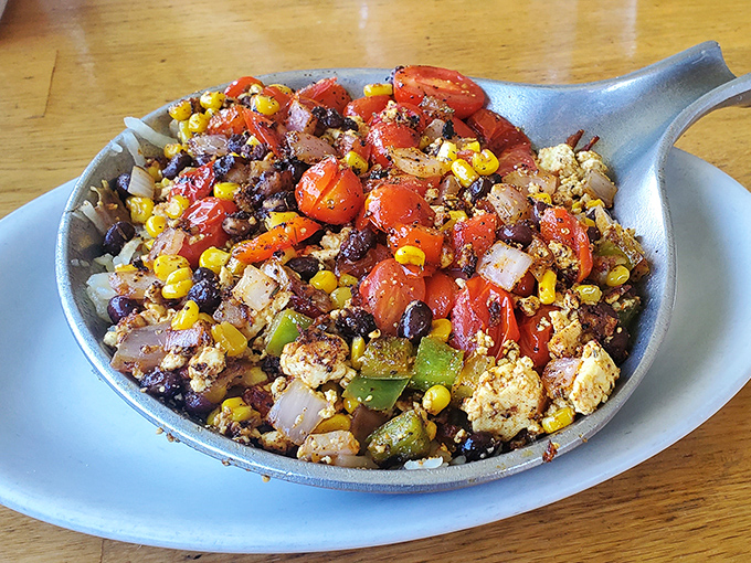 Vibrant colors explode from this hearty skillet – proof that Fort Jesse Cafe knows vegetables deserve the same respect as their meaty counterparts.