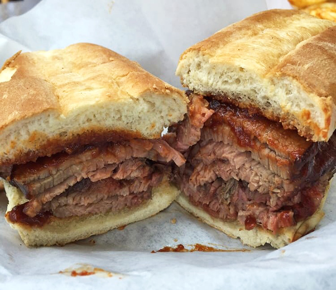 The legendary tri-tip sandwich in all its glory – pink in the middle, charred at the edges, and worth every mile driven.