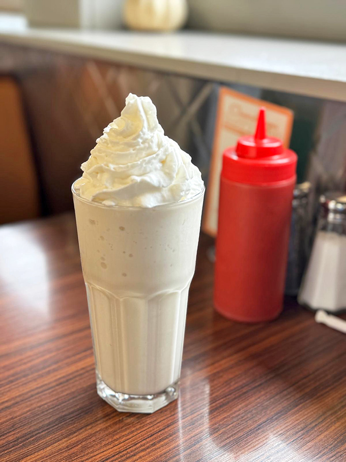 A vanilla milkshake so thick you'll get an arm workout with your dessert—the whipped cream crown makes you feel like royalty.