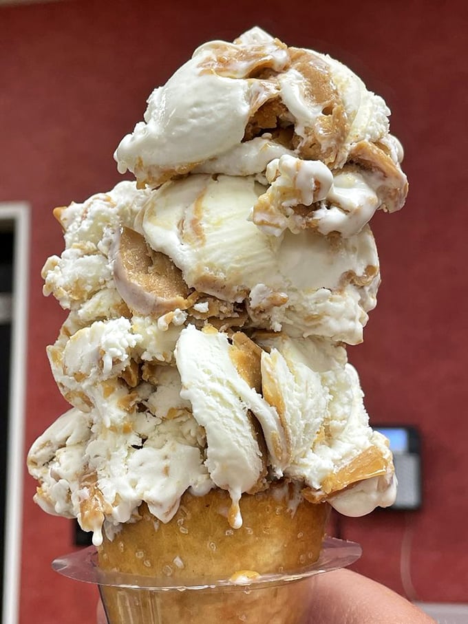 This vanilla peanut butter tower isn't just ice cream – it's architecture. Frank Lloyd Wright would weep at its structural perfection.