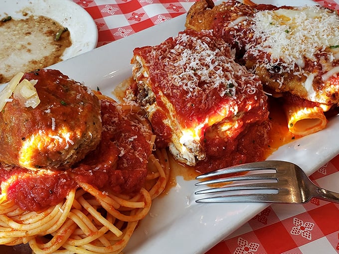 Behold the veal parmigiana – where marinara, melted cheese, and perfectly breaded cutlets unite in a holy trinity of Italian-American perfection.