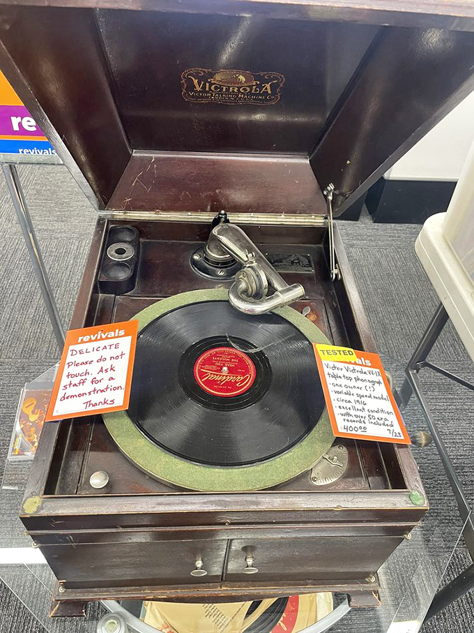 A Victrola that's seen more musical history than most museums. That "TESTED" tag means you could be spinning vinyl tonight.