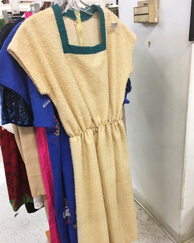 This terry cloth dress with green trim isn't just vintage—it's a time machine to poolside cocktails circa 1975.