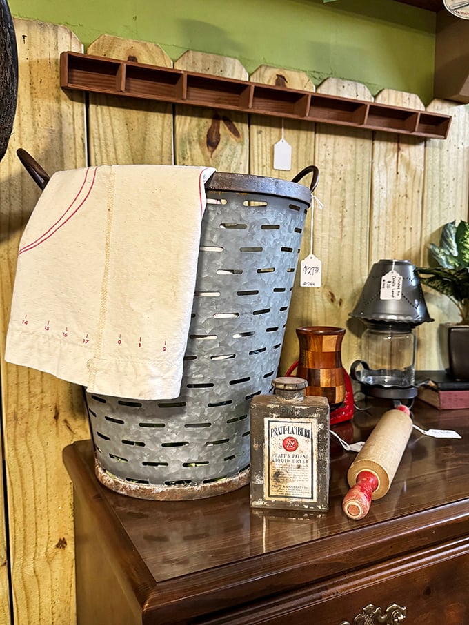 That's not just any olive bucket—it's a time capsule of utility transformed into farmhouse chic that Joanna Gaines would fight you for.