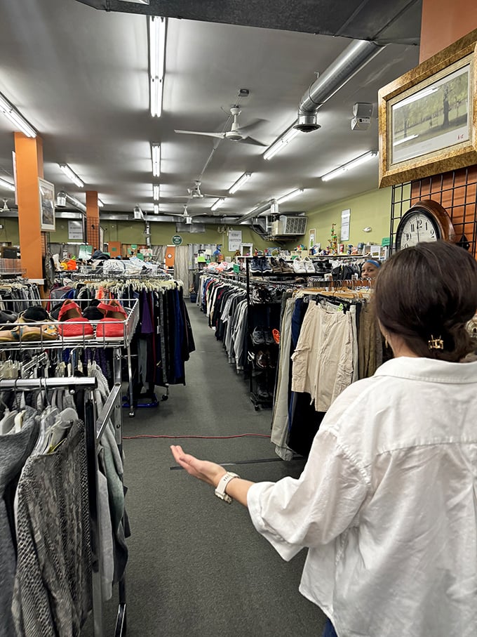 The thrill of the hunt captured in motion—navigating these well-organized aisles feels like an archaeological expedition for fashion treasures.