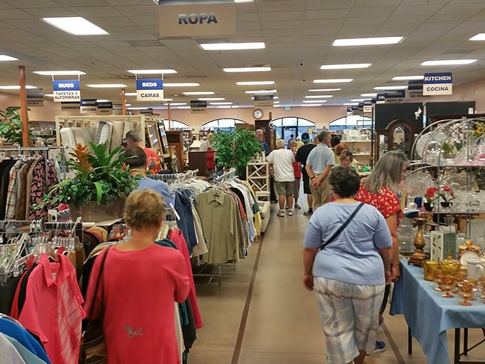 The universal language of bargain hunting brings shoppers together under signs that helpfully guide you in both English and Spanish.