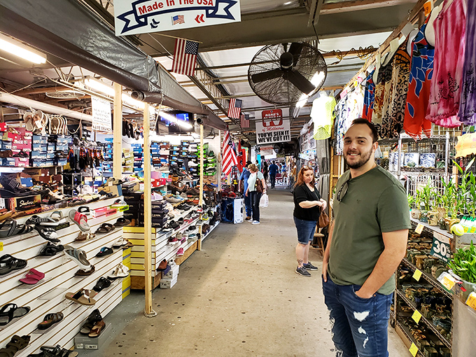 The aisles of Renninger's buzz with the energy of discovery—where shoes, flags, and unexpected conversations create the authentic flea market experience.