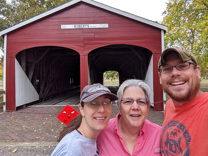 The bridge doesn't just connect two banks—it connects generations. Families make memories here that will outlast even these sturdy timbers.