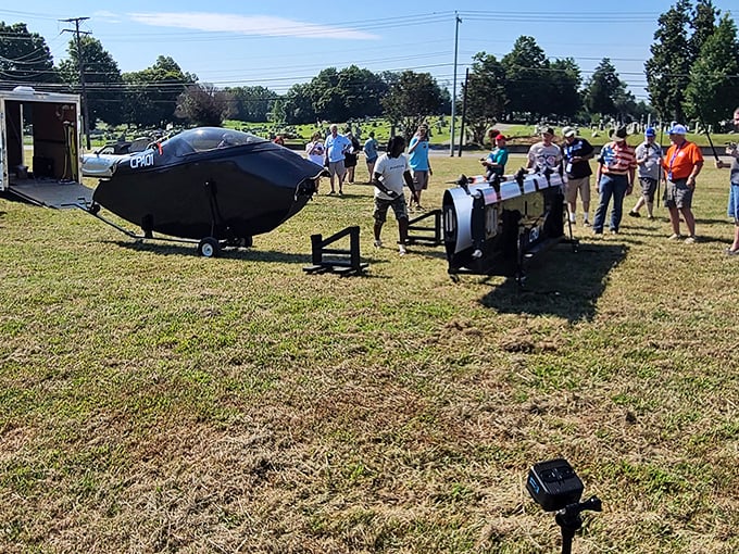 Visitors gather around what appears to be a submarine-inspired creation—proof that art brings people together, even in rural Tennessee.