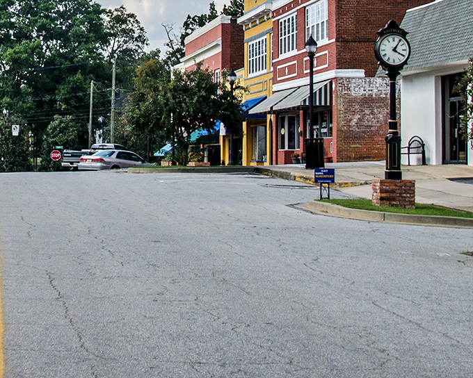 That town clock isn't just keeping time—it's preserving it, standing sentinel over a Main Street where rushing is still considered impolite.