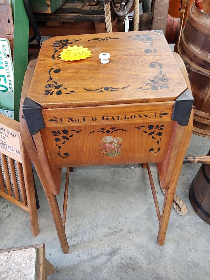 This antique butter churn isn't just furniture—it's a time machine to when "homemade" meant arm-strengthening labor of love rather than a Pinterest board.