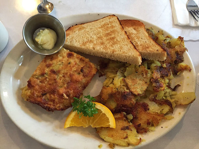 This isn't just breakfast—it's edible art. The frittata's golden crust hides a treasure of flavors beneath, while those home fries deserve their own fan club. 