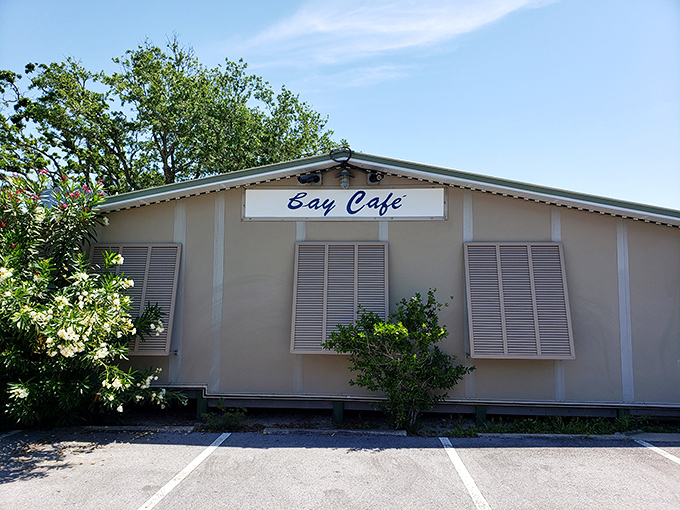 The Bay Café's unassuming exterior hides what locals know: paradise doesn't need fancy packaging when the food speaks volumes.