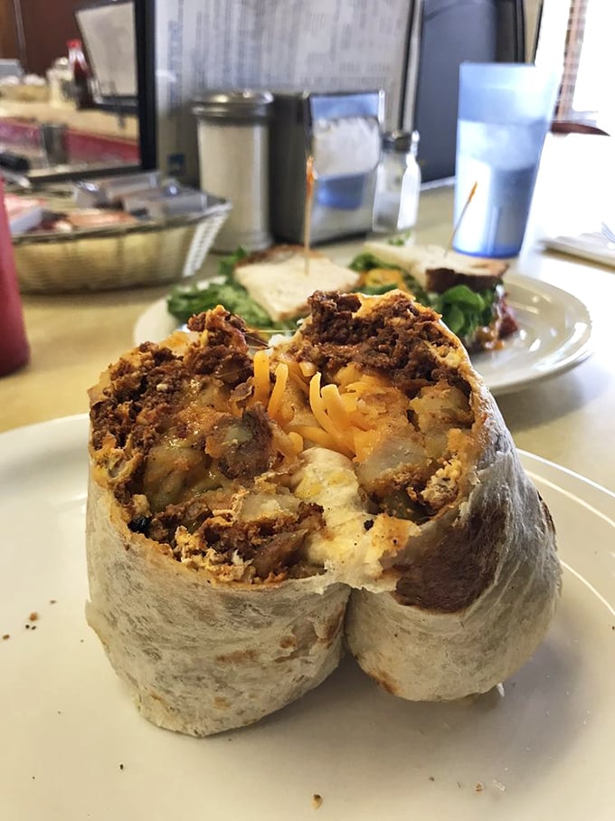 This breakfast burrito isn't just a meal, it's an engineering marvel—eggs, potatoes, and meat wrapped in a tortilla fortress of flavor.