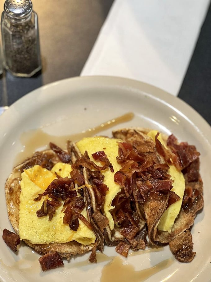 Breakfast tacos aren't just a meal—they're edible sunshine. Fluffy eggs and crispy bacon nestled in a tortilla create the perfect handheld happiness.