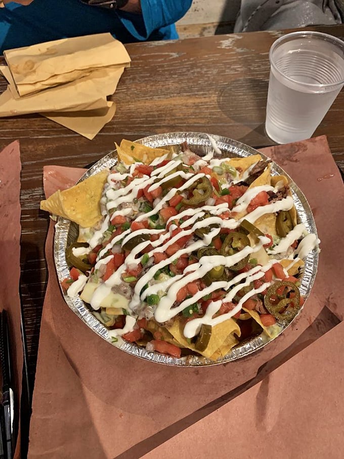 These nachos aren't messing around—loaded with brisket, jalapeños, and enough cheese to make Wisconsin nervous.