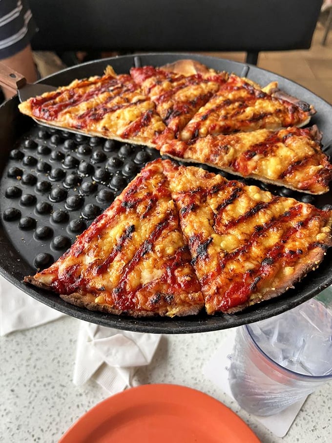 The perfect cheese pizza isn't just a myth—it's right here in St. Joseph. That char pattern deserves its own Instagram account.