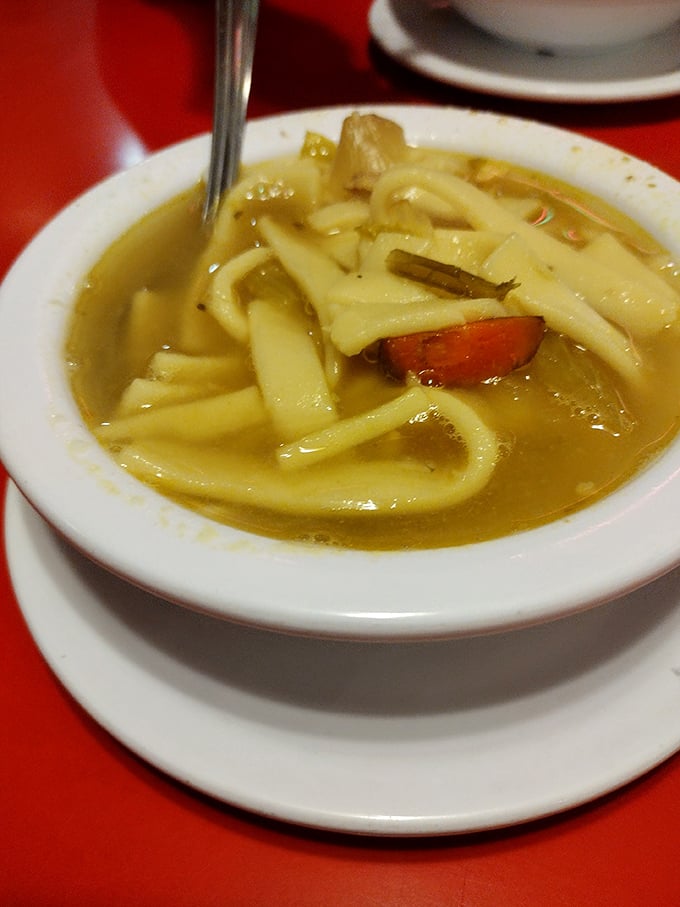 Chicken noodle soup that could heal whatever ails you – thick, homestyle noodles swimming in golden broth that tastes like childhood.