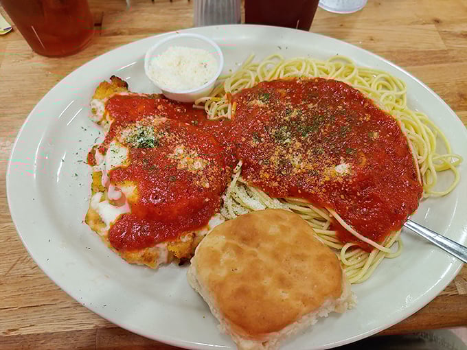 Chicken Parmesan that would make any Italian grandmother nod in approval. The sauce-to-cheese ratio achieves that perfect harmony rarely found outside Naples.