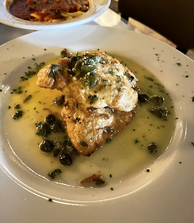 Golden chicken bathed in a buttery lemon sauce with capers—proof that simplicity, when done right, creates the most memorable flavors.