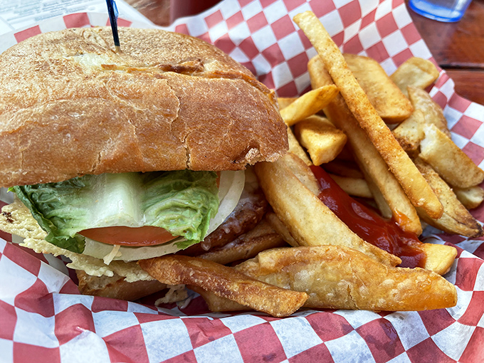 A sandwich that means business! Fresh seafood tucked into a crusty roll with all the fixings and a side of perfectly crisp fries.