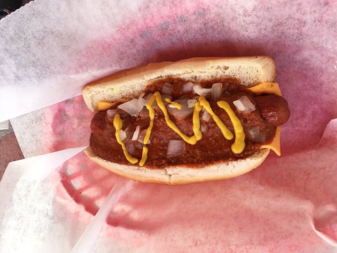 This isn't just a chili dog—it's a masterclass in comfort food architecture, where each spoonful of chili adds another layer of happiness.