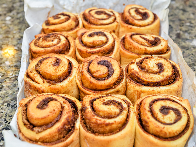 Fresh cinnamon rolls lined up like soldiers ready for battle – the battle against boring breakfasts everywhere. Victory never tasted so sweet.