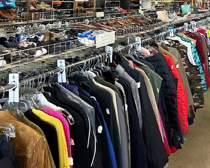 Clothing racks organized by size and type—a rare luxury in thrift store adventures. No archaeological digging required.