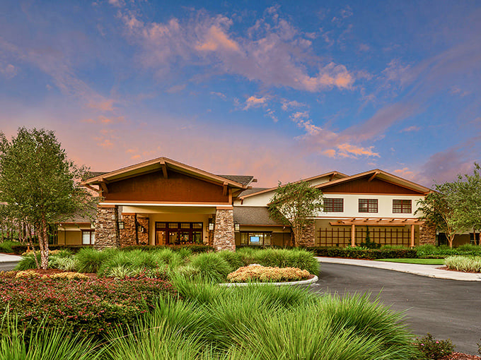 The clubhouse at sunset – where "meeting for drinks" feels less like a social obligation and more like checking into a boutique resort.