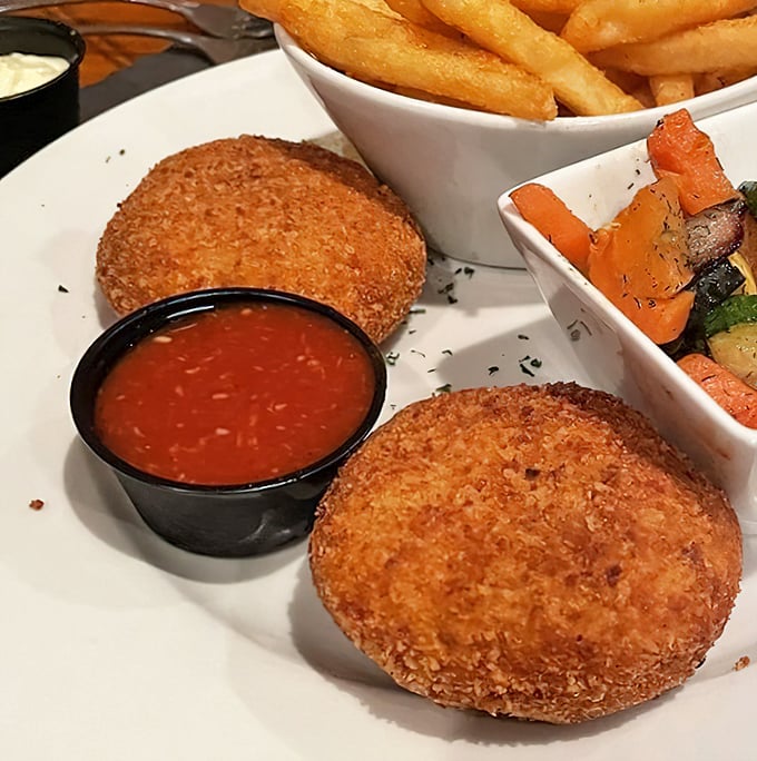 Golden-brown crab cakes that don't hide behind fillers—just pure, luscious crabmeat waiting to meet its destiny with your taste buds.