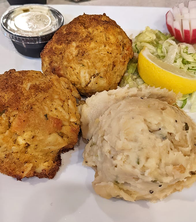 These crab cakes contain actual crab—revolutionary concept!—with just enough binding to keep the seafood party together.