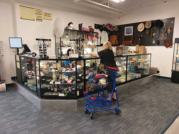 The jewelry counter—where patient staff help shoppers discover that perfect vintage brooch or barely-worn watch hiding among the everyday treasures.