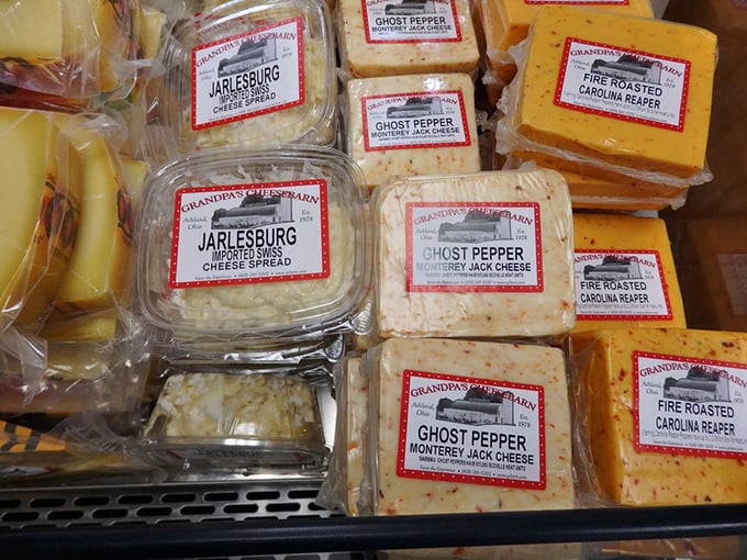 The cheese selection reads like poetry: Ghost Pepper Monterey Jack, Fire Roasted Carolina Reaper—spicy autobiographies in dairy form.
