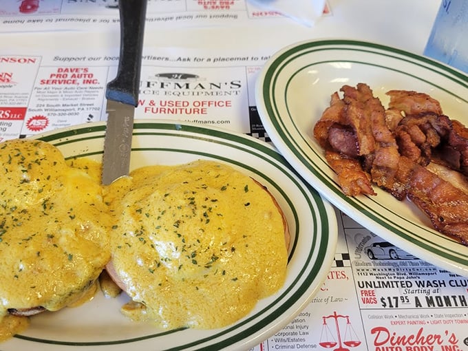 This isn't just an omelet—it's a golden envelope of breakfast joy, delivering cheese and herbs alongside crispy bacon that means business.