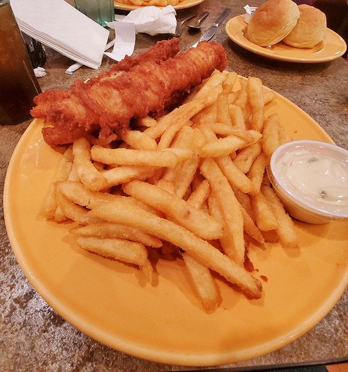 This isn't just fish and chips—it's a golden-battered reminder that sometimes the most satisfying meals don't need fancy plating or pretentious descriptions.