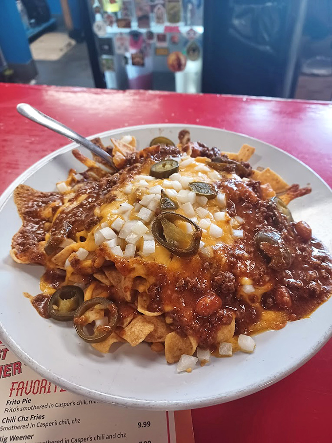 The Frito Pie at Casper's is what comfort food dreams are made of—a glorious mountain of chips, chili, cheese, and toppings that demands a fork and your full attention.