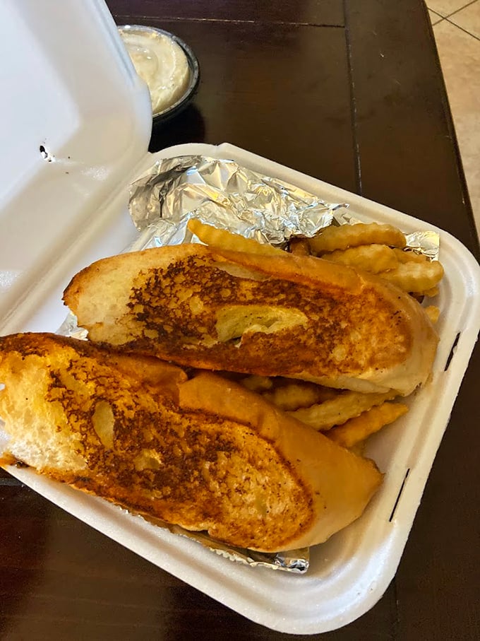 A grilled cheese sandwich that's had a proper introduction to heat. Paired with crinkle-cut fries, it's comfort food that graduated with honors.
