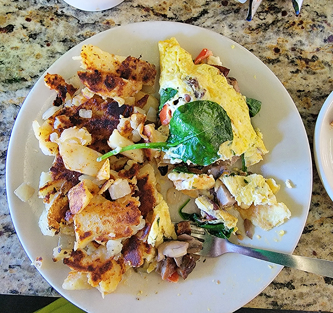 The infamous home fries—crispy on the outside, tender within. These potato masterpieces have probably prevented several local divorces.
