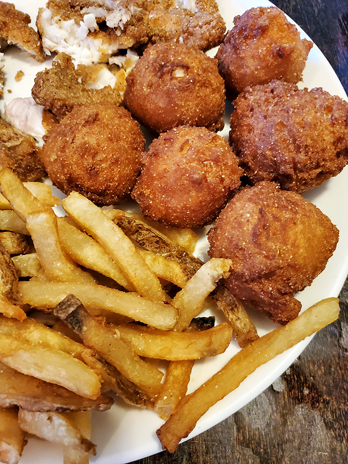 Hush puppies so perfectly golden they deserve their own spotlight. Crispy outside, tender inside—the supporting actors that steal the show.