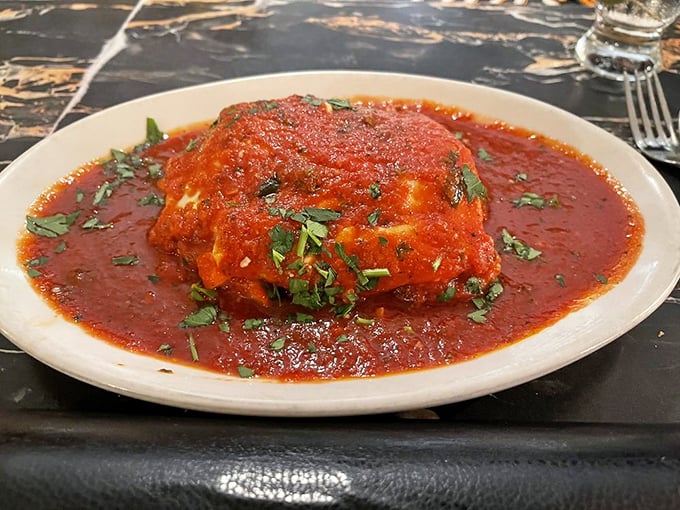 This lasagna towers like the Leaning Tower of Pisa, but infinitely more delicious and structurally sound.