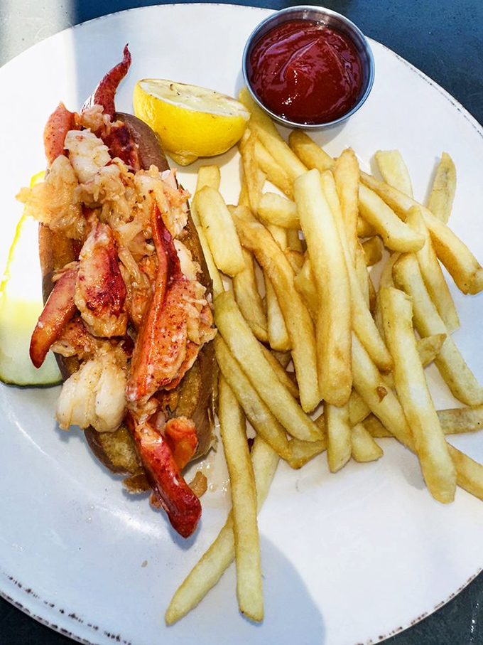 The lobster roll that launched a thousand road trips—sweet chunks of lobster meat nestled in a buttery vessel of carb perfection.