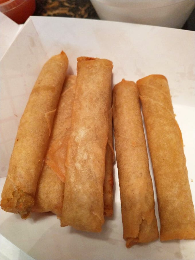 These crispy lumpia are like the opening act that threatens to upstage the headliner—crunchy, savory perfection that demands your attention.