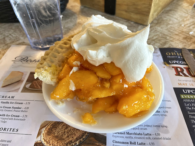 Peach pie à la mode: where summer fruit meets vanilla ice cream in a relationship your diet counselor wouldn't approve of.