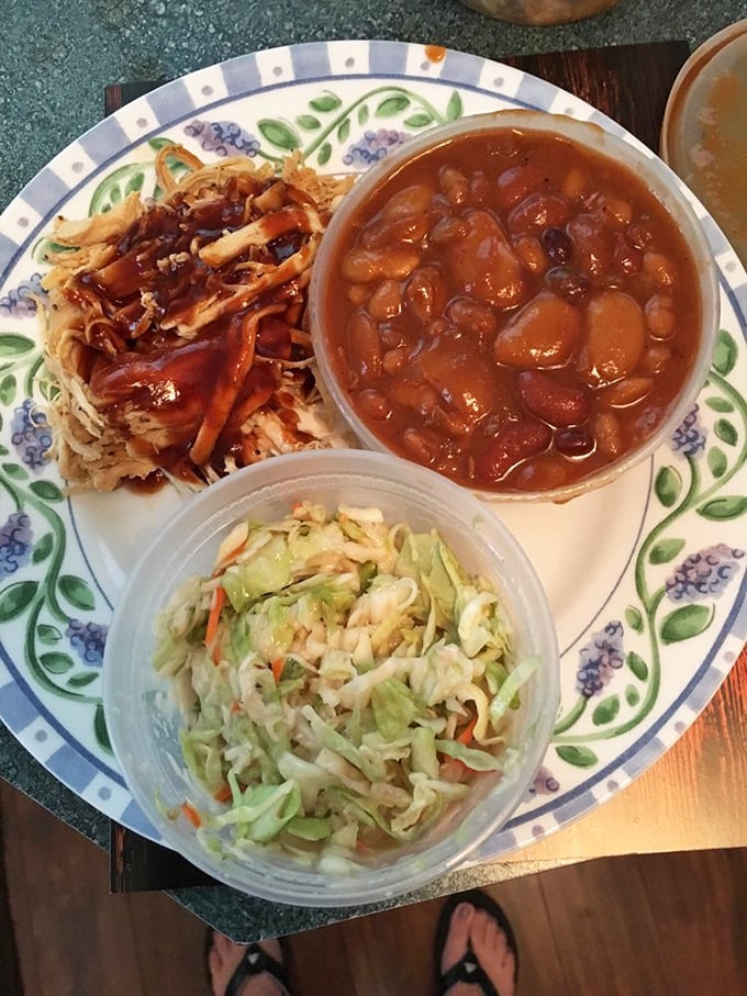 Pulled chicken, coleslaw, and beans – the holy trinity of barbecue sides that makes every meal feel like Sunday dinner.