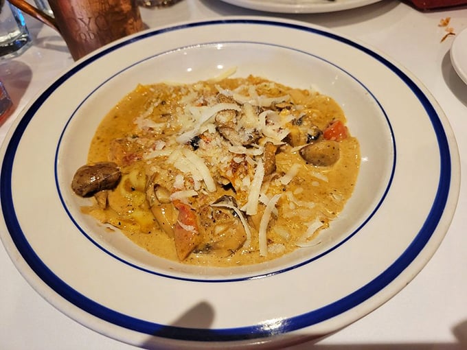 This creamy mushroom pasta isn't just comfort food; it's therapy in a bowl with a side of "why can't I make this at home?"