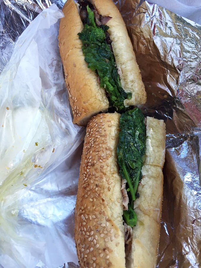 Broccoli rabe and pork on a sesame roll—a sandwich so good it makes vegetables feel like they're getting away with something.