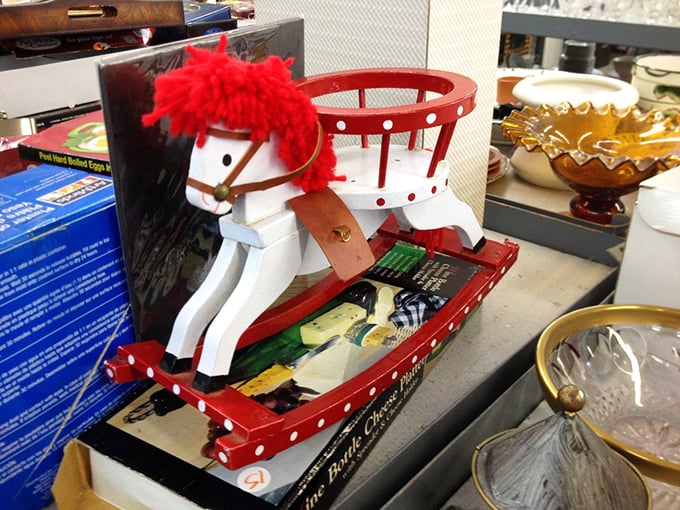 Yesterday's toys waiting for tomorrow's joy—this rocking horse has probably seen more Christmas mornings than Santa himself.